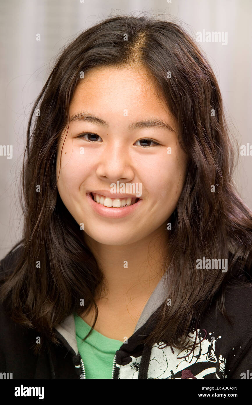 Asian teenage girl with smiling face Stock Photo - Alamy