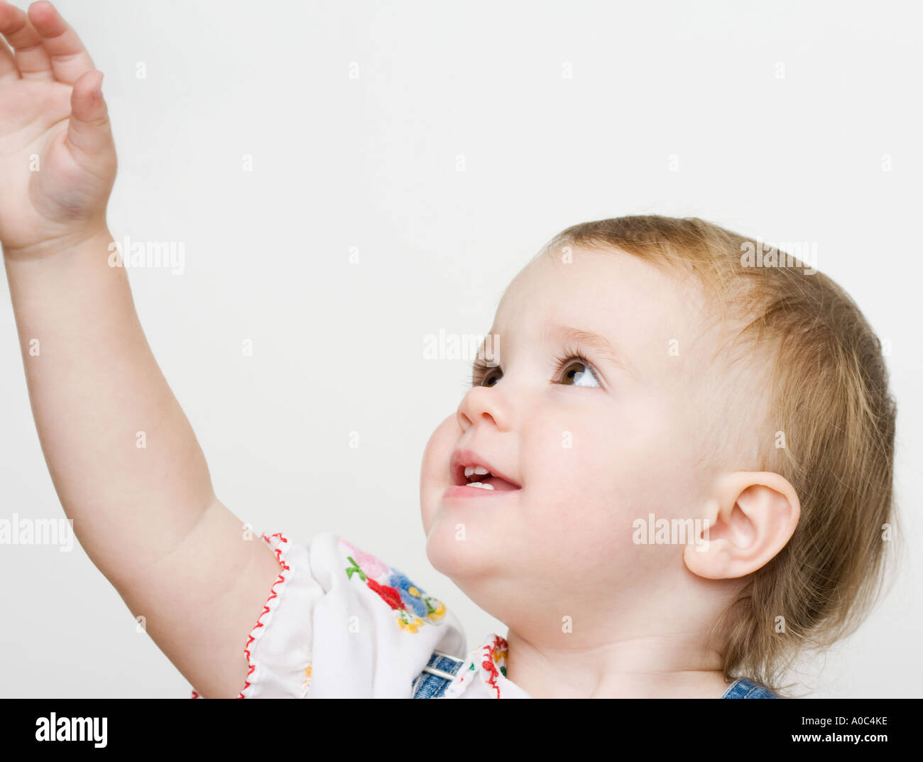 Toddler reaching up hi-res stock photography and images - Alamy