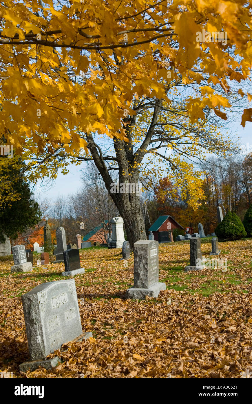 Stock image of a cemetery with fall foliage colours Stock Photo - Alamy