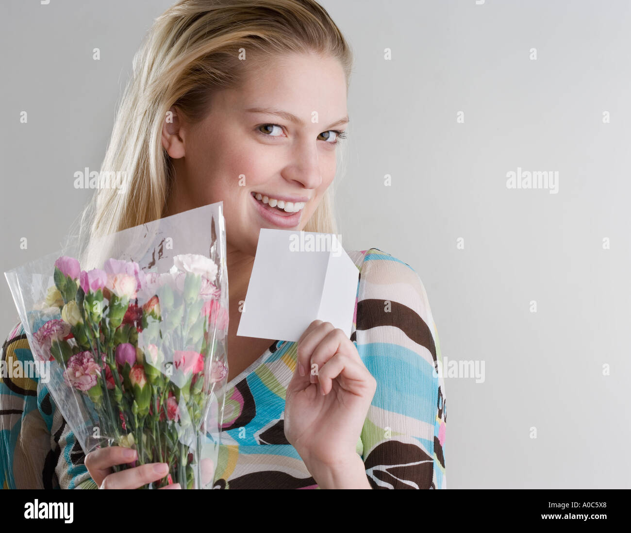 Woman receiving flowers surprised hi-res stock photography and images ...