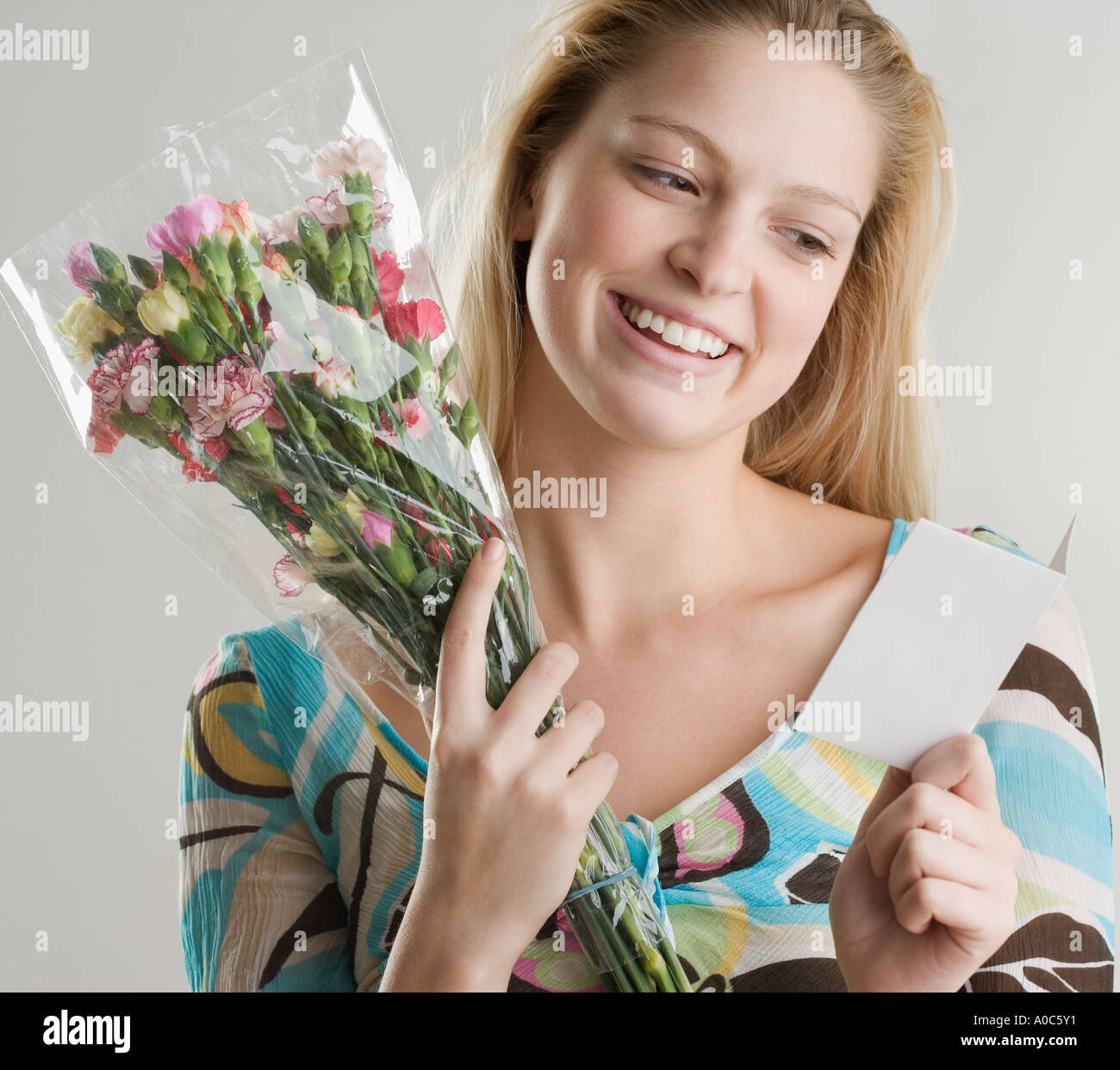 Woman receiving flowers surprised hi-res stock photography and images ...