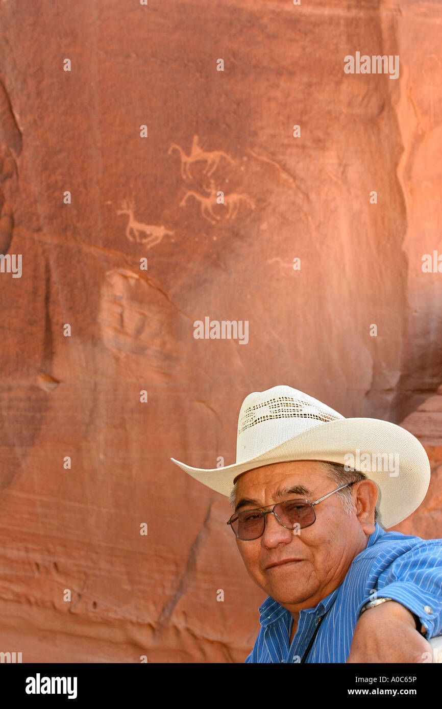 Navajo guide and Native pictographs Stock Photo - Alamy