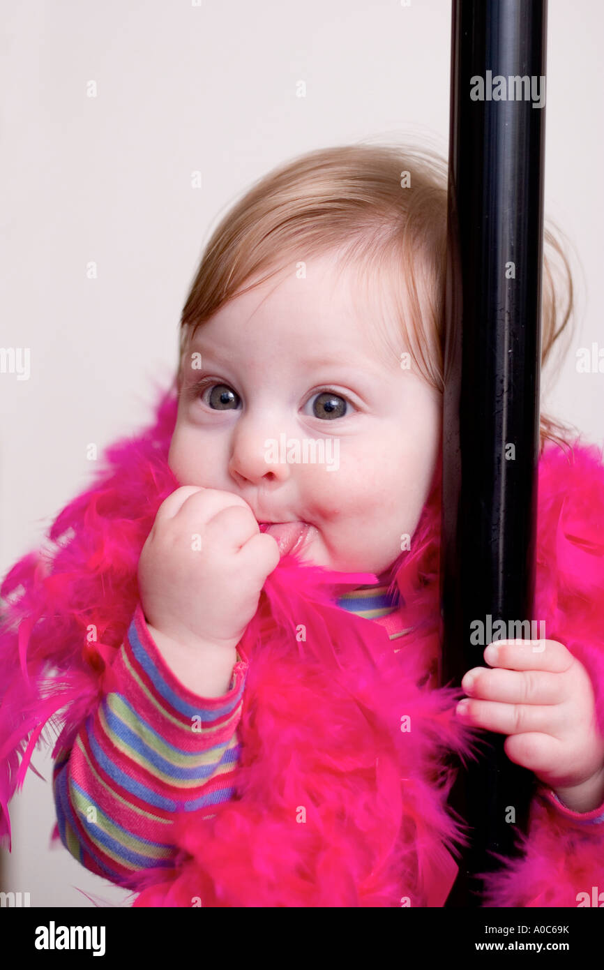 Baby Dancing with Pole Stock Photo - Alamy