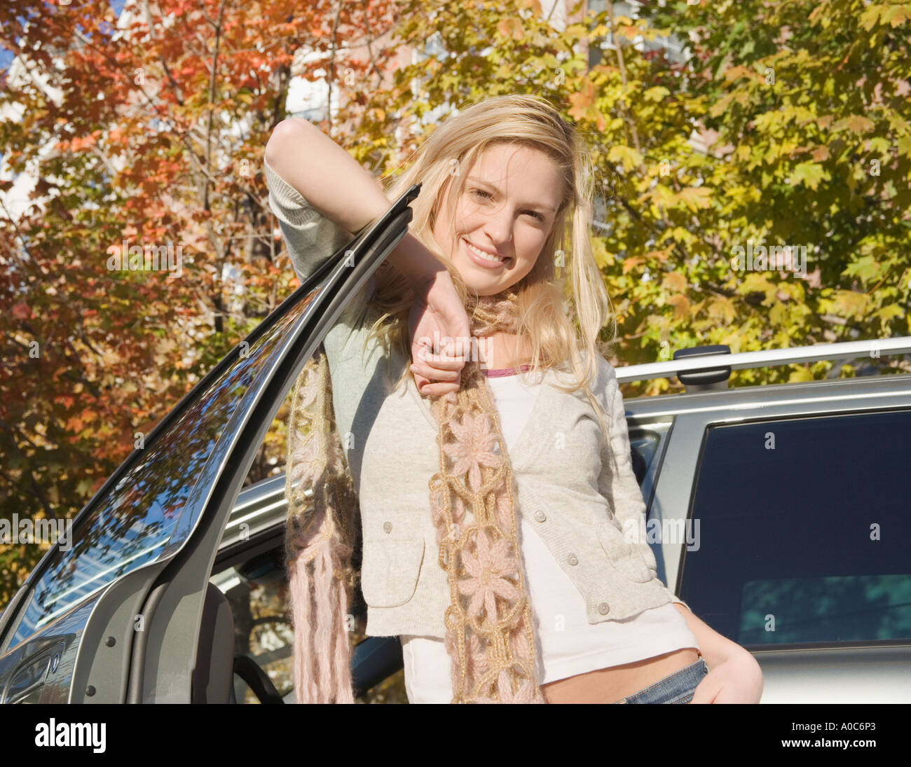 Female model posing car hi-res stock photography and images - Alamy