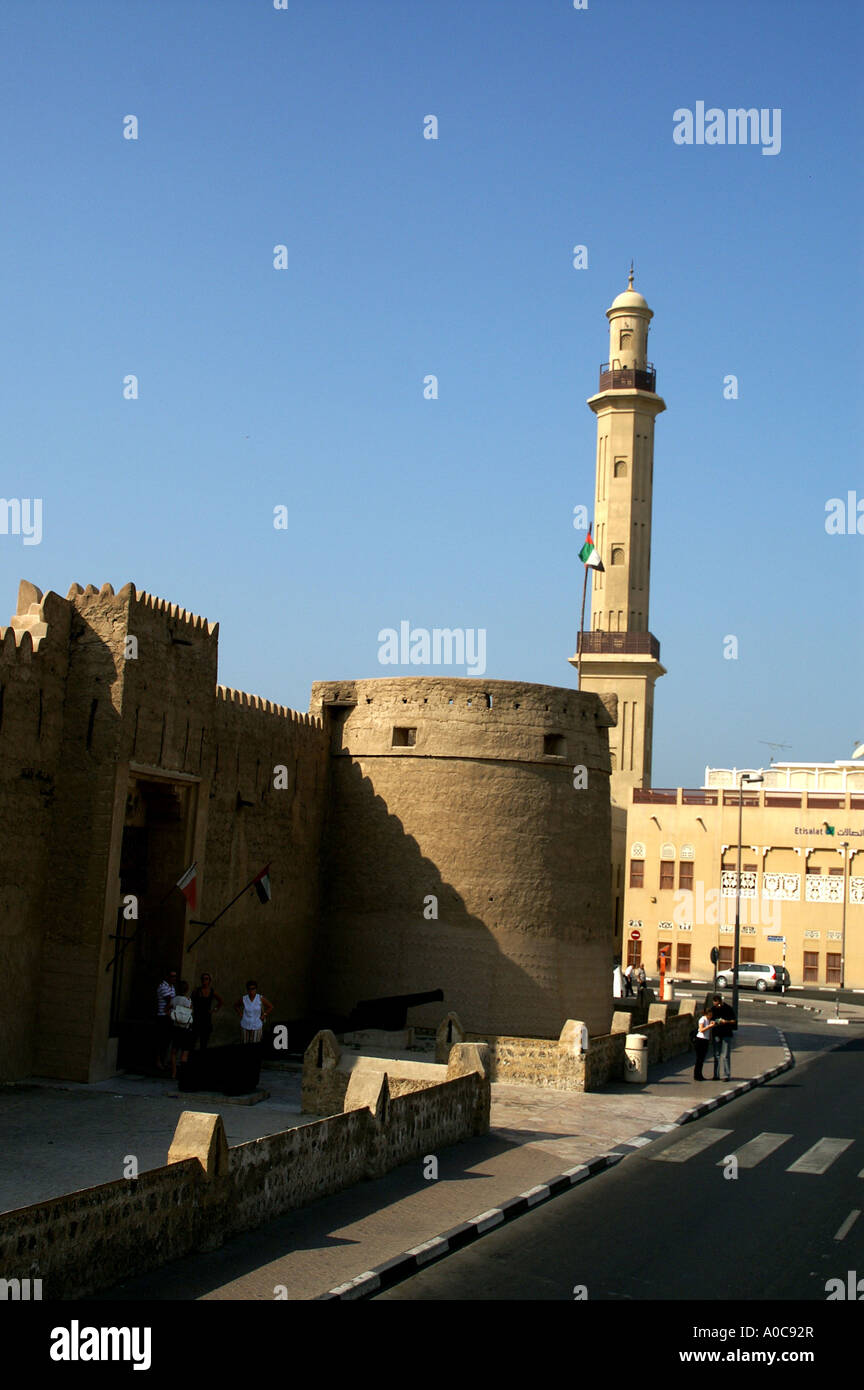 Mosque behind the Dubai museum wall UAE Stock Photo - Alamy