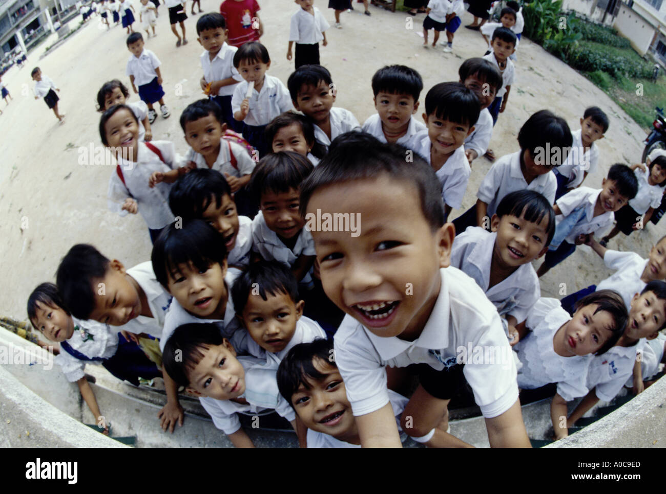 Children climbing over fence hi-res stock photography and images - Alamy