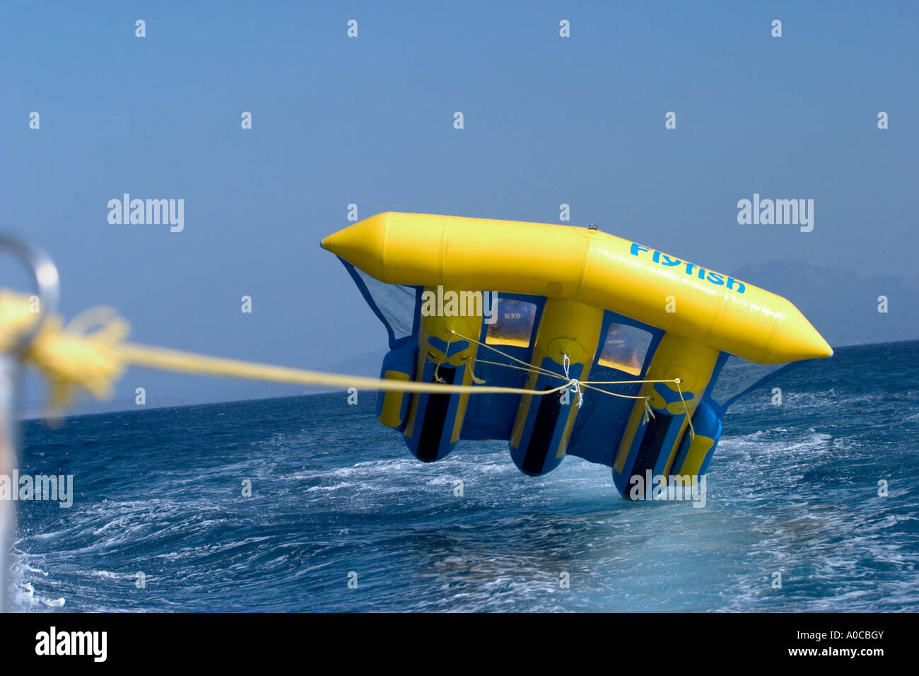 fun in riding an inflatable boat pulled by an outboard motor Stock ...