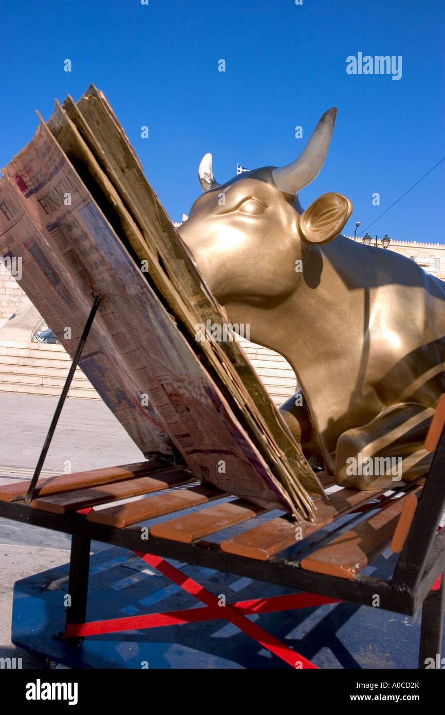 cow parade reading a book Stock Photo - Alamy