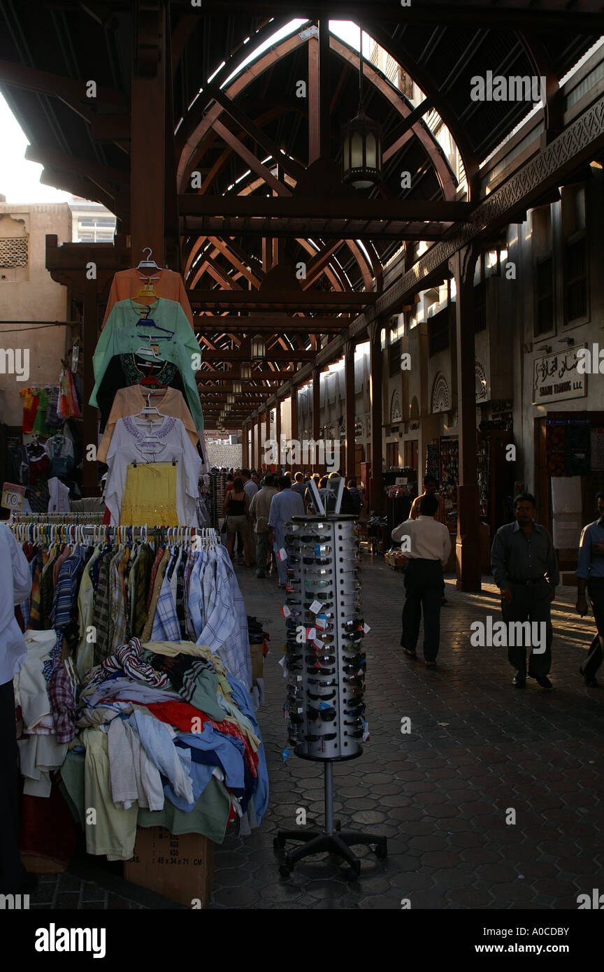 Clothes for sale on display in Souk Dubai Stock Photo - Alamy
