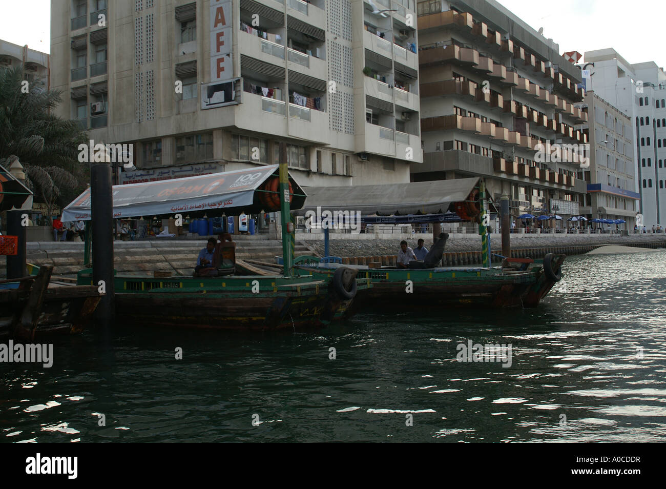 Passenger craft ferrying people across the creek in Dubai Stock Photo ...