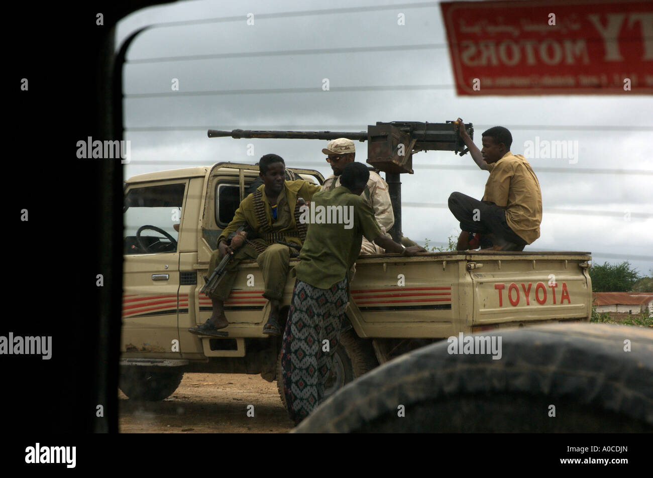 Somali militia on a Technical support vehicle fitted with 12.7mm anti ...
