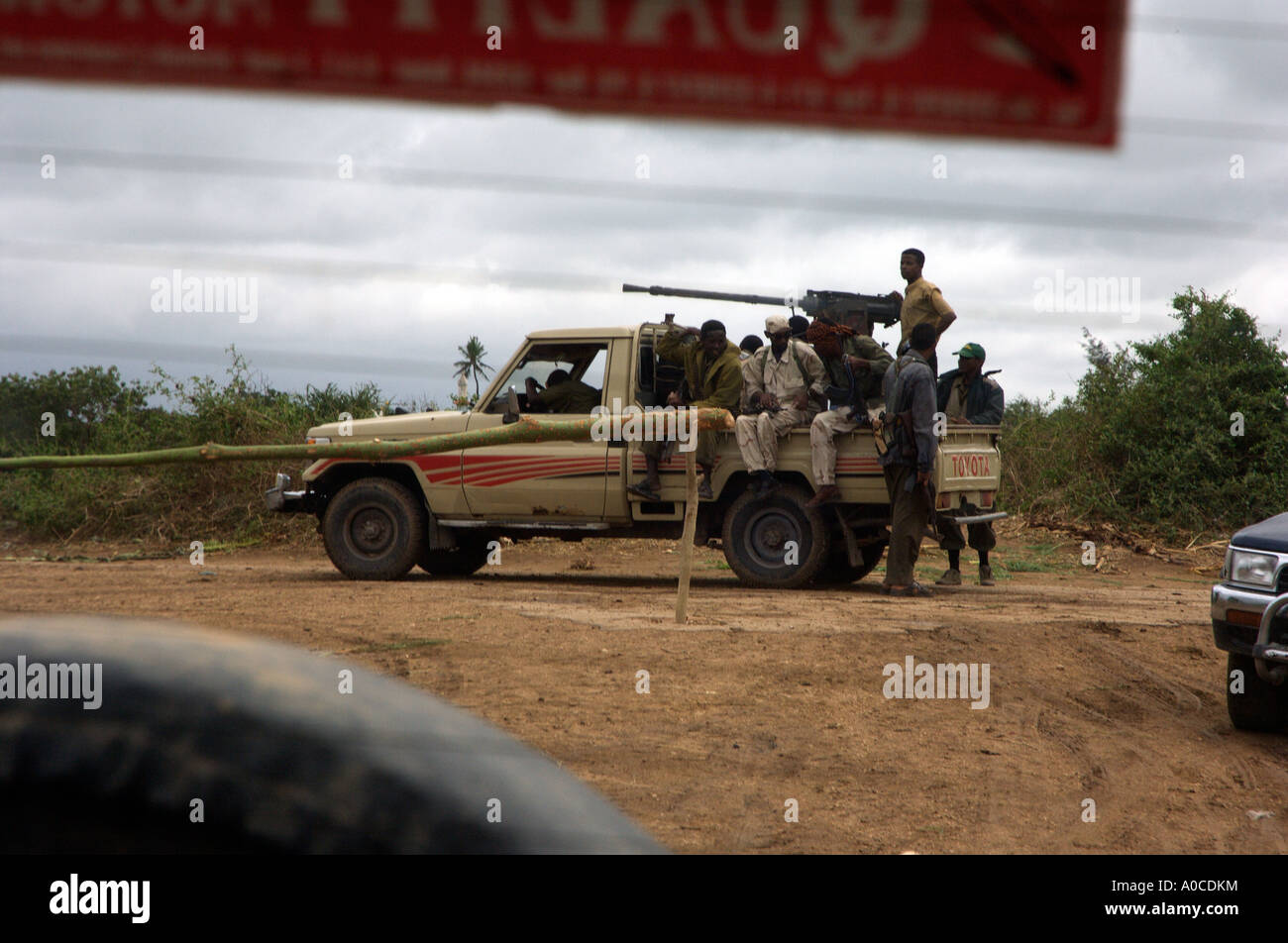 Somali militia on a Technical support vehicle fitted with 12.7mm anti ...