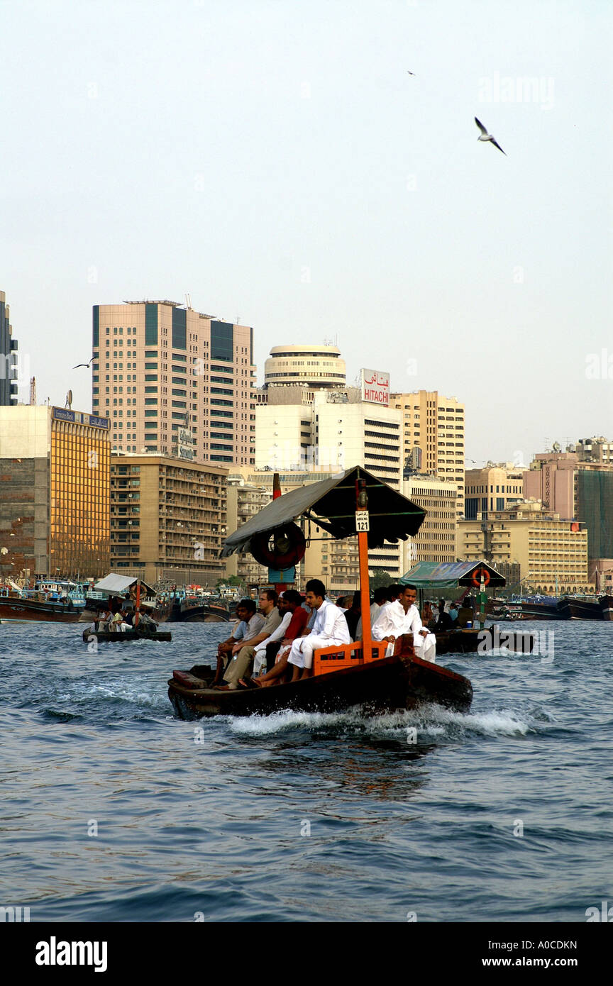 Passenger craft ferrying people across the creek in Dubai Stock Photo ...