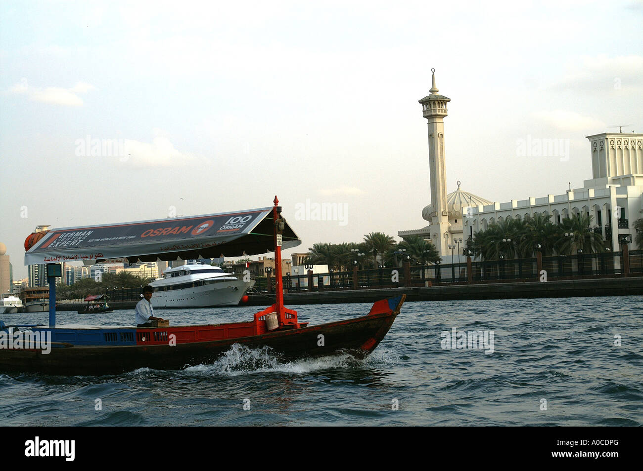 Passenger craft ferrying people across the creek in Dubai Stock Photo ...