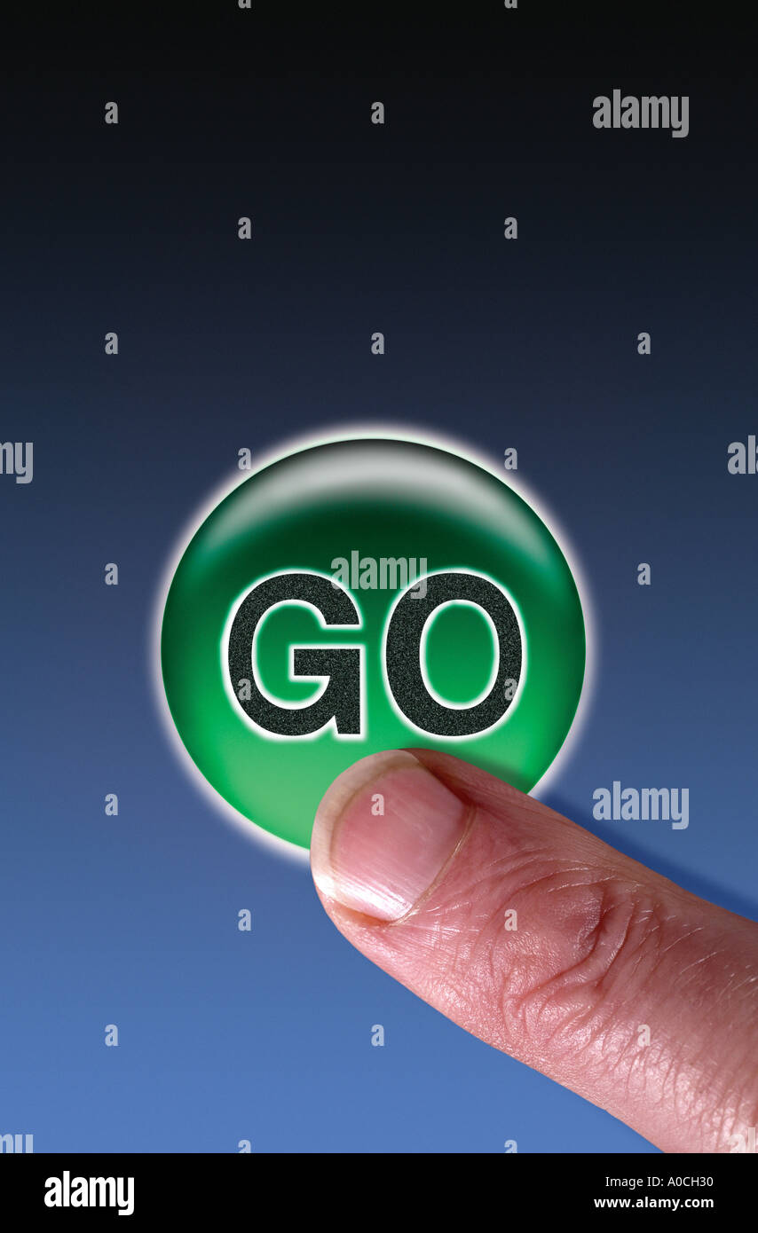 finger on the go button Stock Photo - Alamy