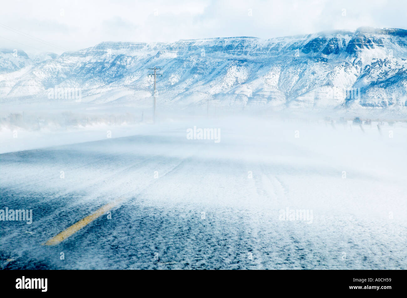 Blowing snow and road with Hart Mountain Warner Valley Oregon Stock ...