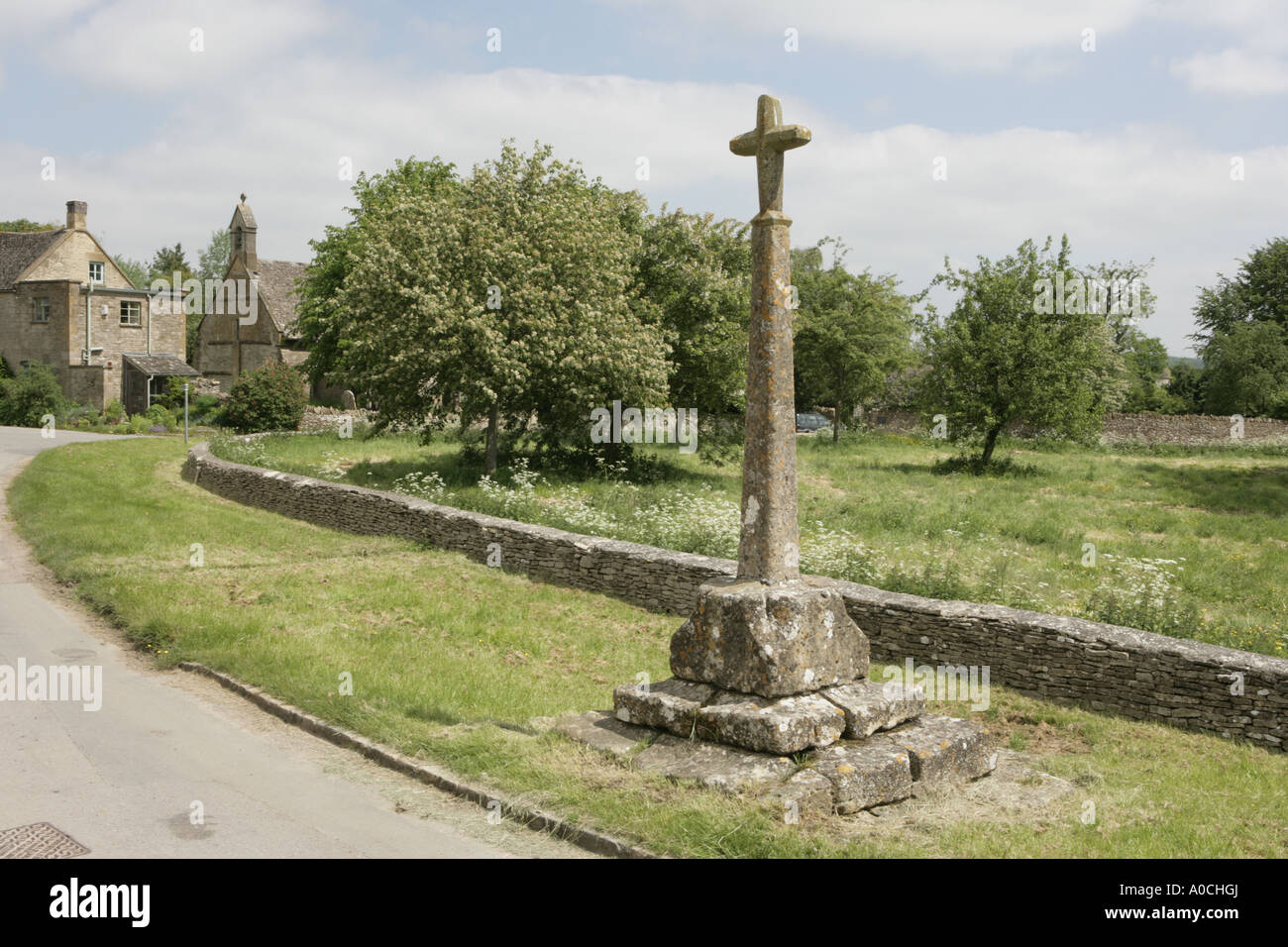 A stone cross called a Wayside cross beside the green in the Wayside ...