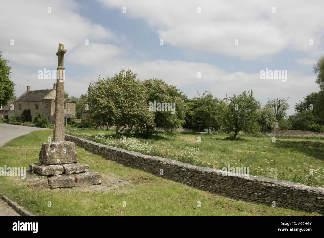 A stone cross called a Wayside cross beside the green in the Wayside ...