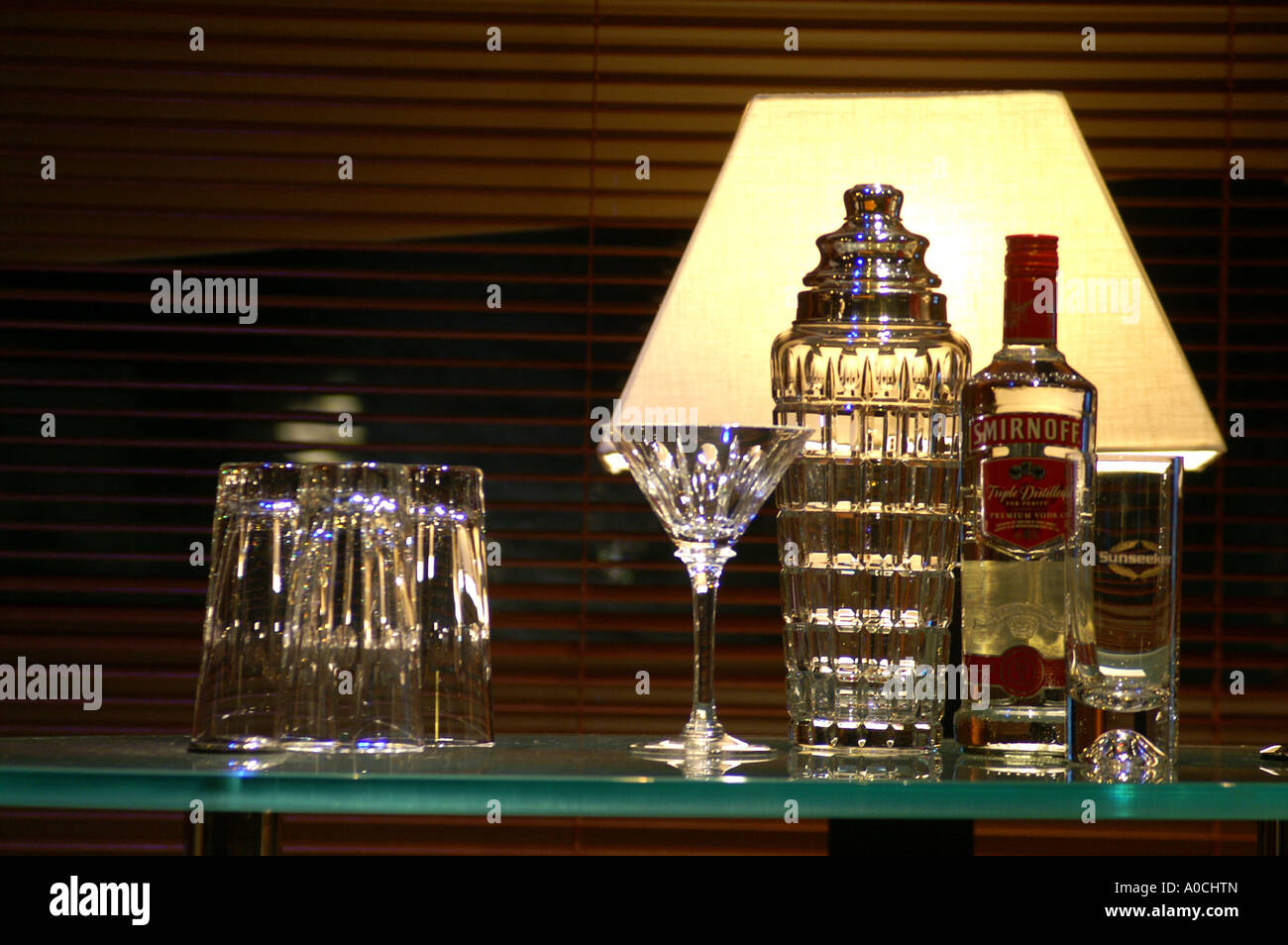 Smirnoff vodka bottle and crystal cut glasses Stock Photo - Alamy