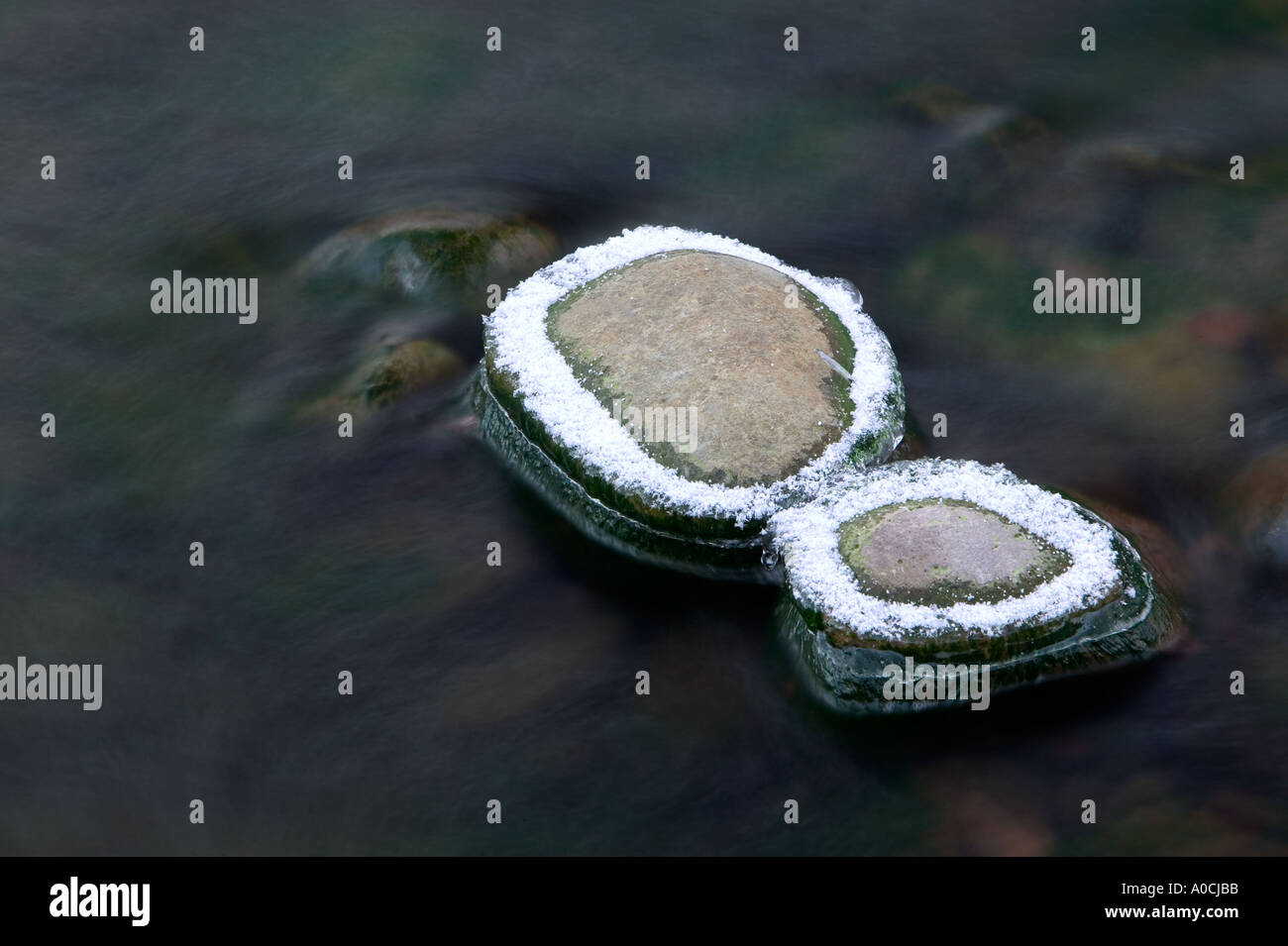 Rim ice and snow on Lostine River Oregon Stock Photo - Alamy