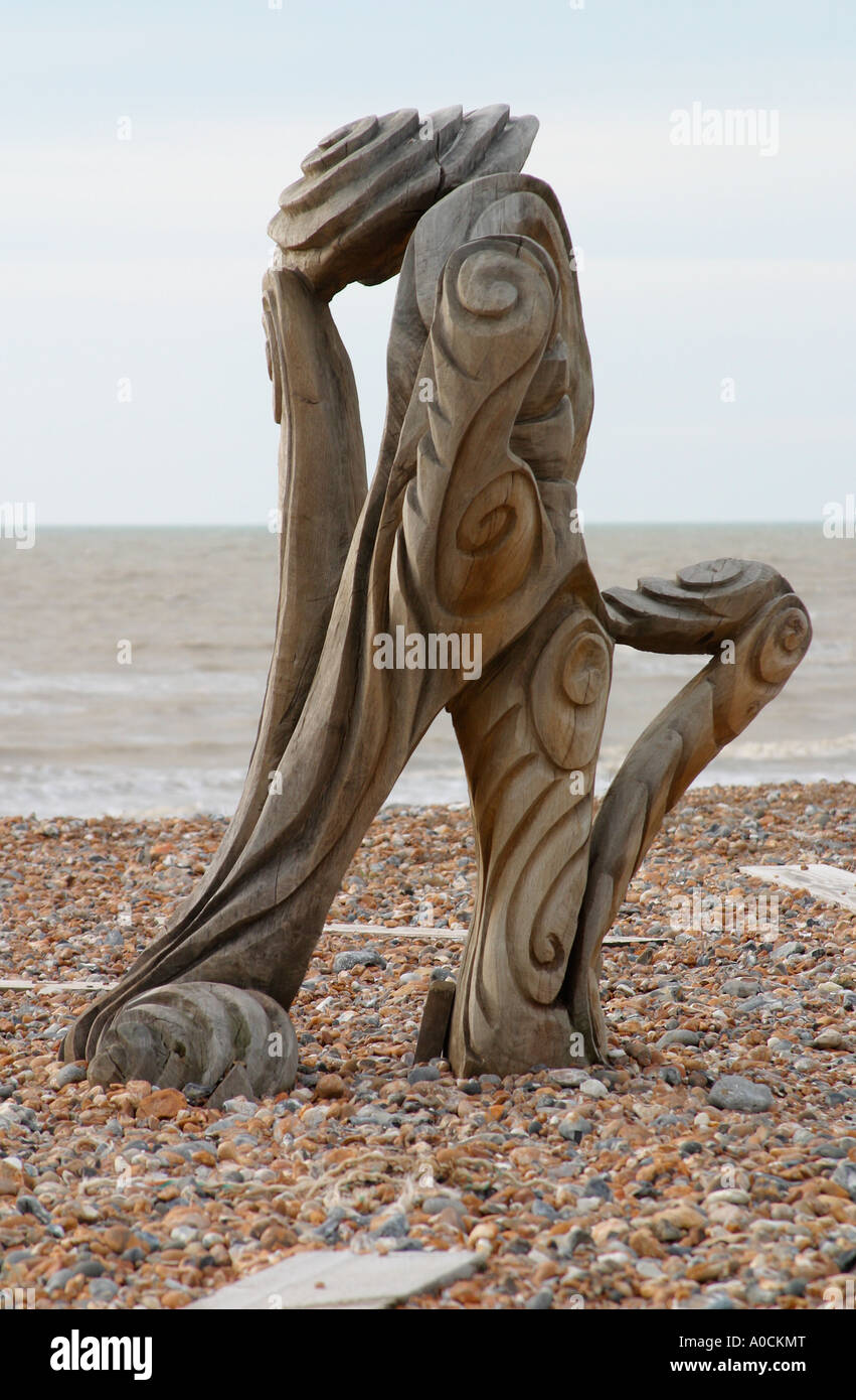 Driftwood carving in shingle garden on the Foreshore at West Parade in ...