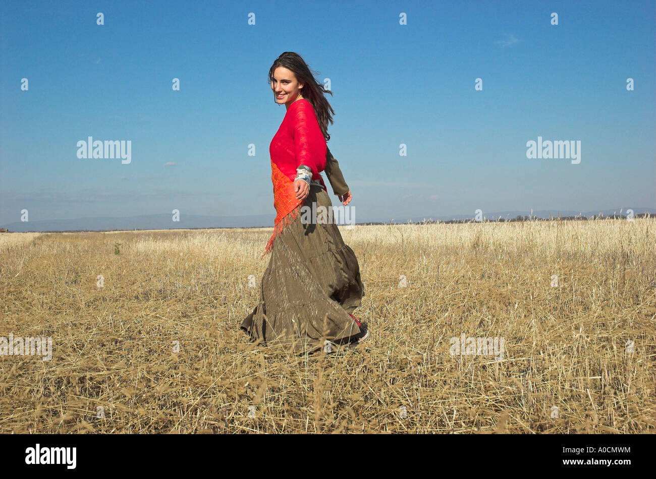 Woman twirling skirt hi-res stock photography and images - Alamy