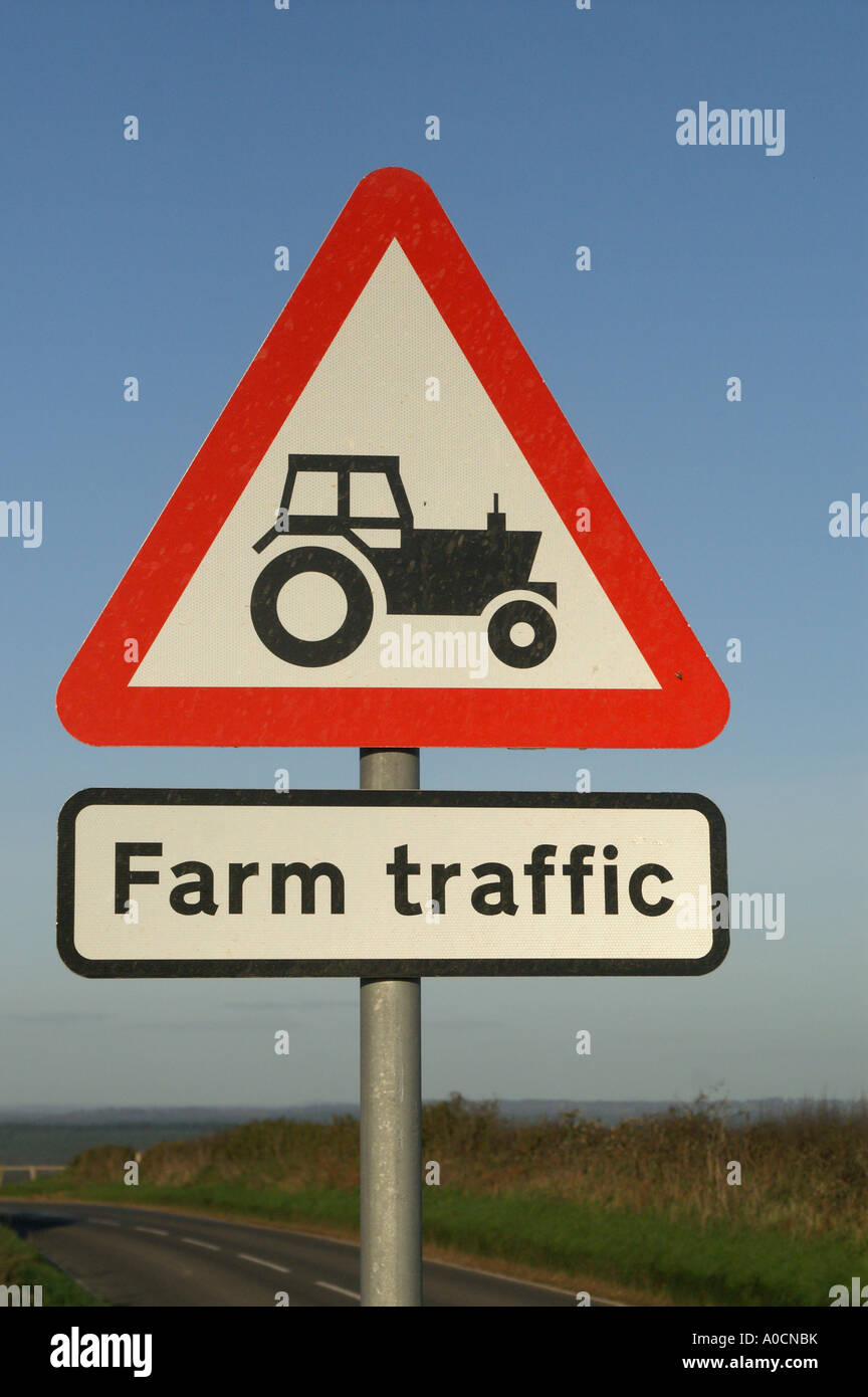 Road sign showing a farm tractor Stock Photo - Alamy