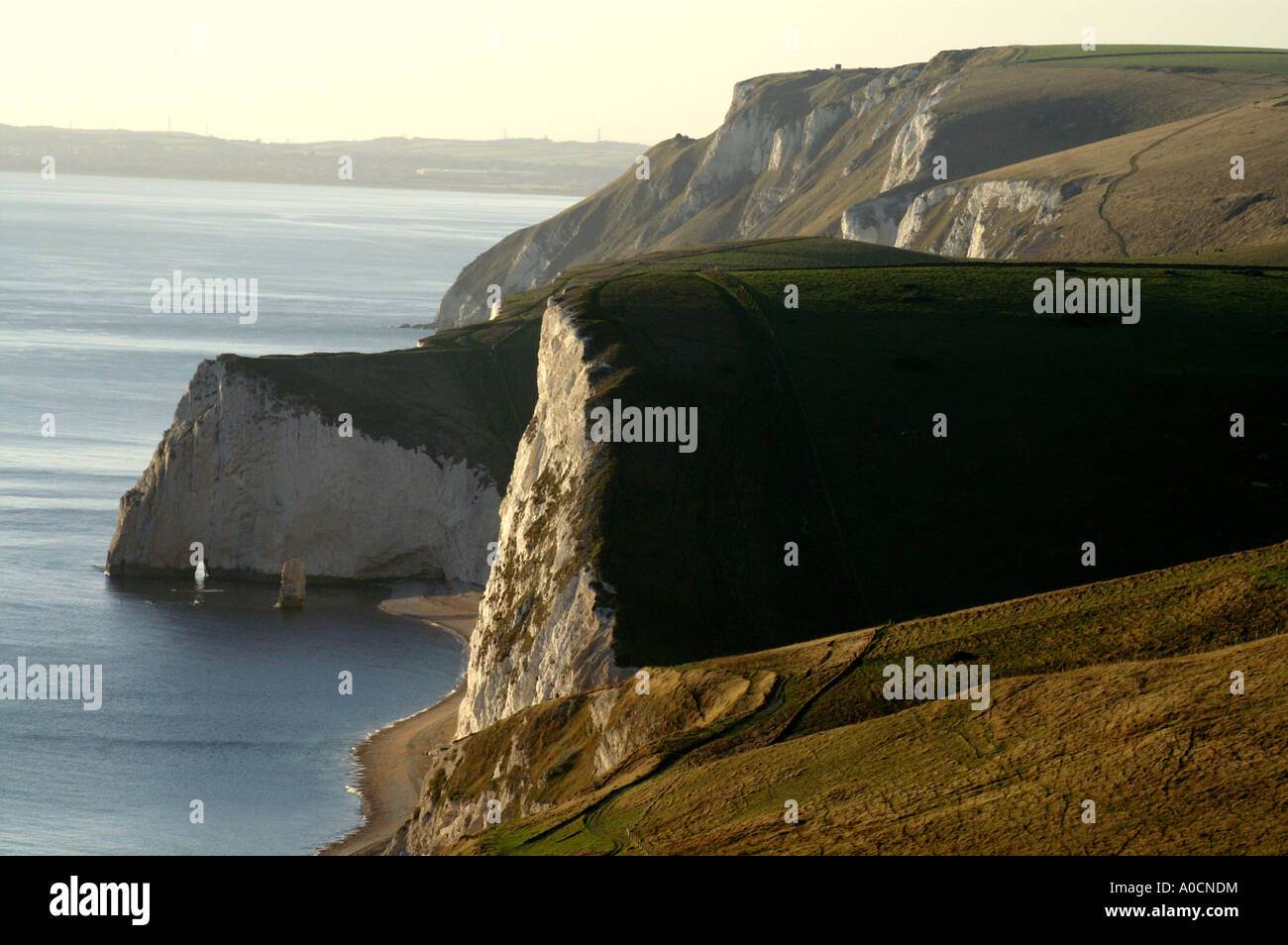 Durdle door in late afternoon in Autumn on Jurassic coast Dorset ...