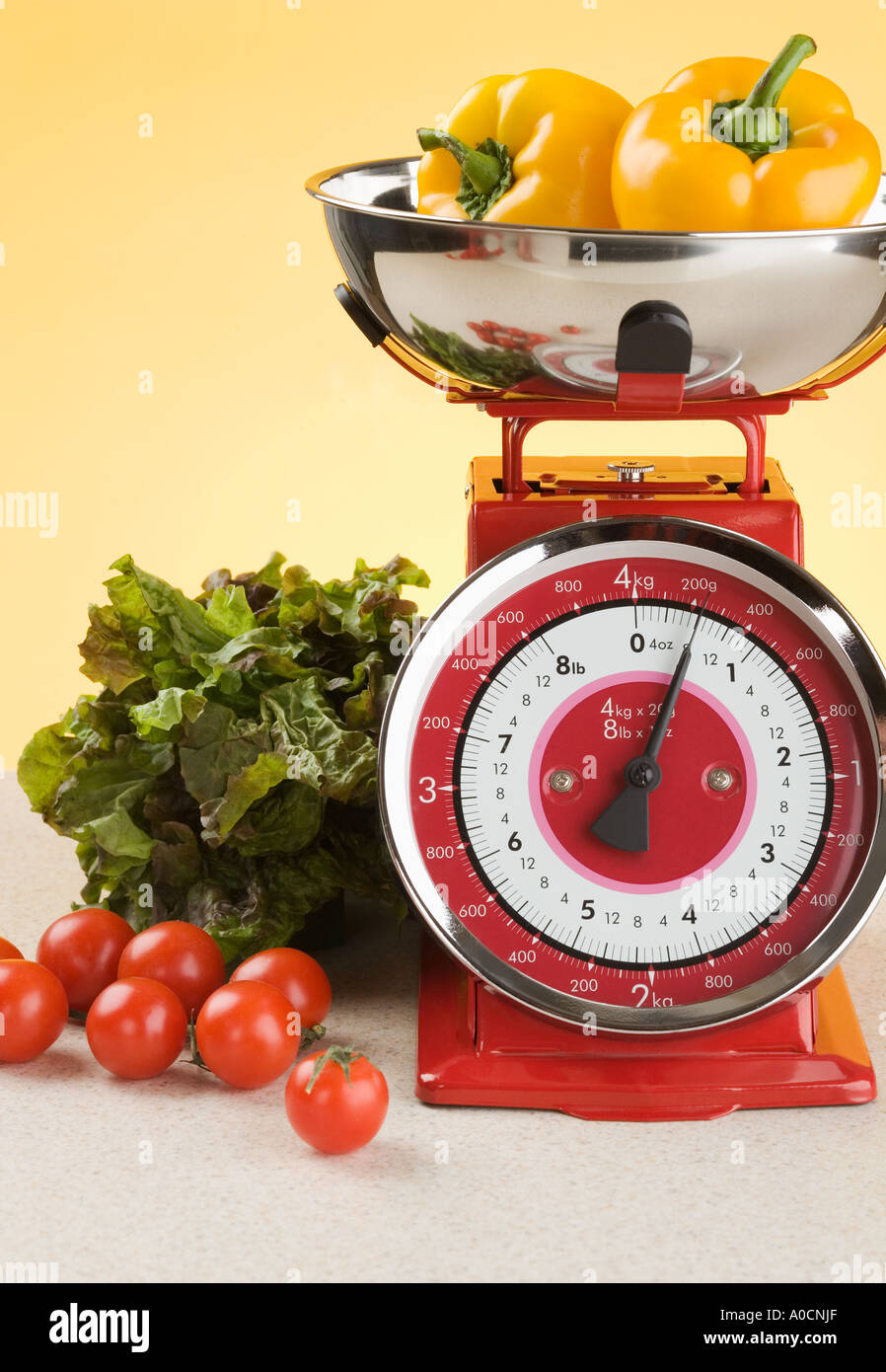 Still life of scale and produce Stock Photo - Alamy