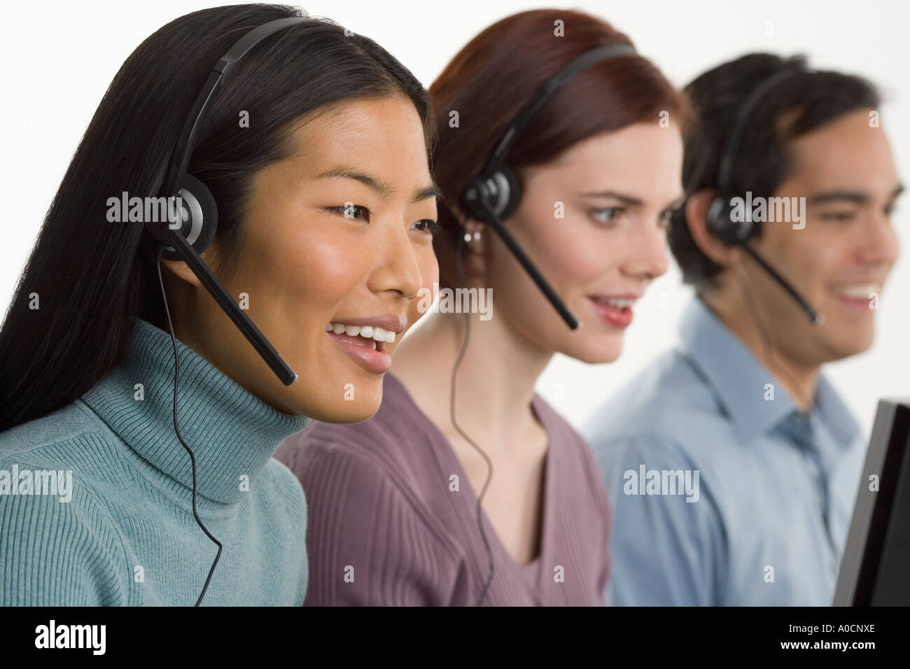Phone operators using headsets Stock Photo - Alamy
