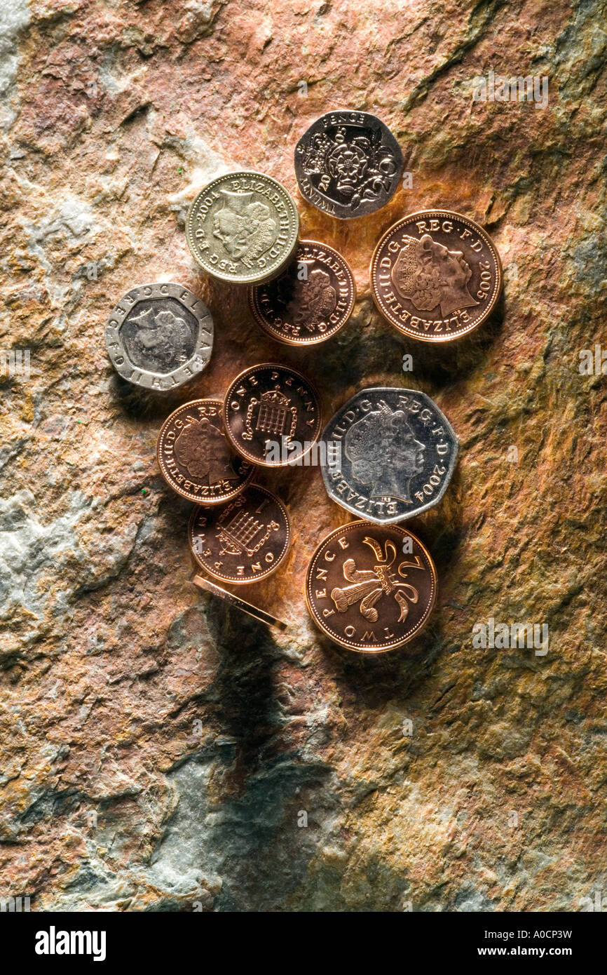 British money coins on rock Stock Photo - Alamy
