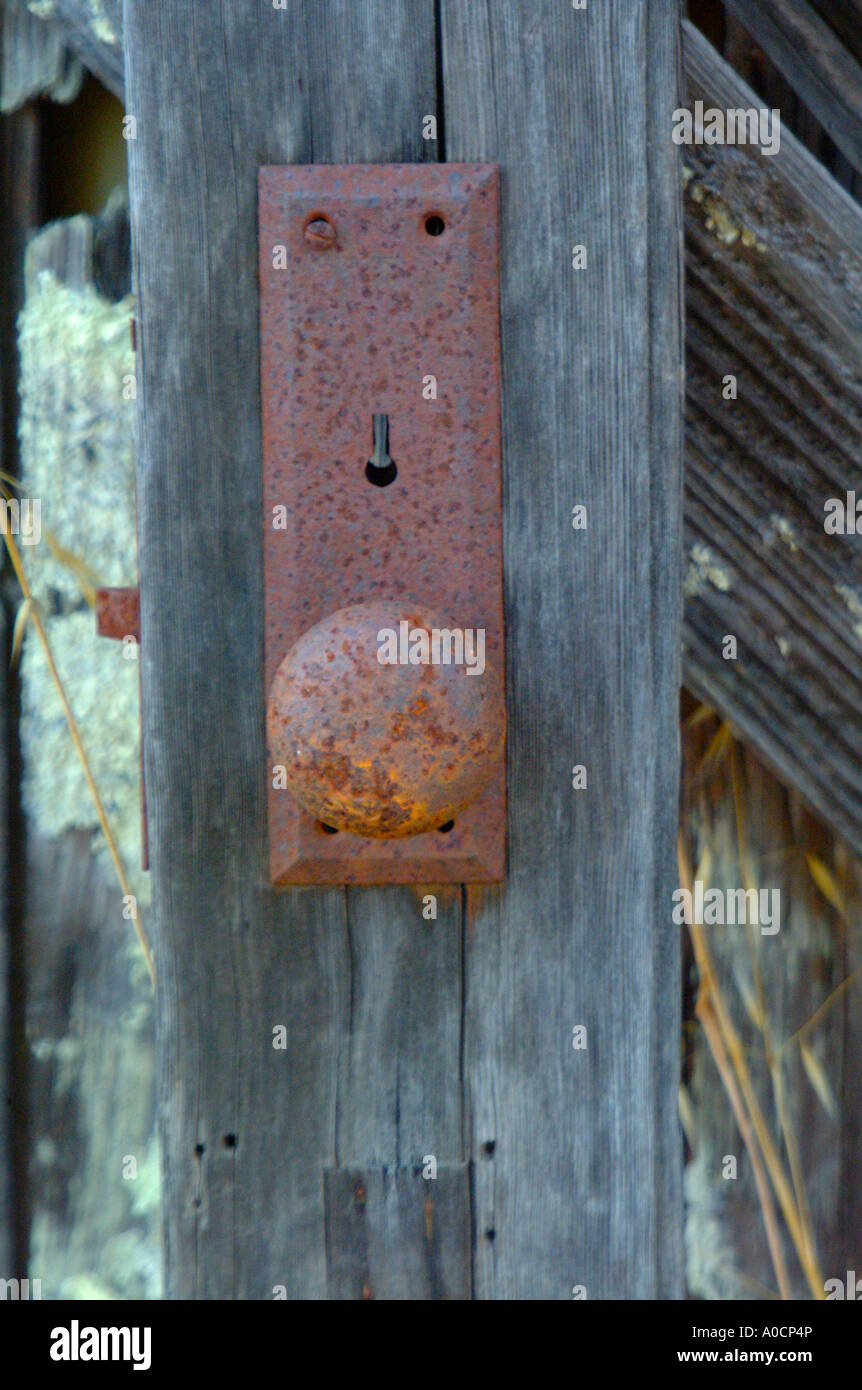 An old rusty door knob and lock Stock Photo - Alamy