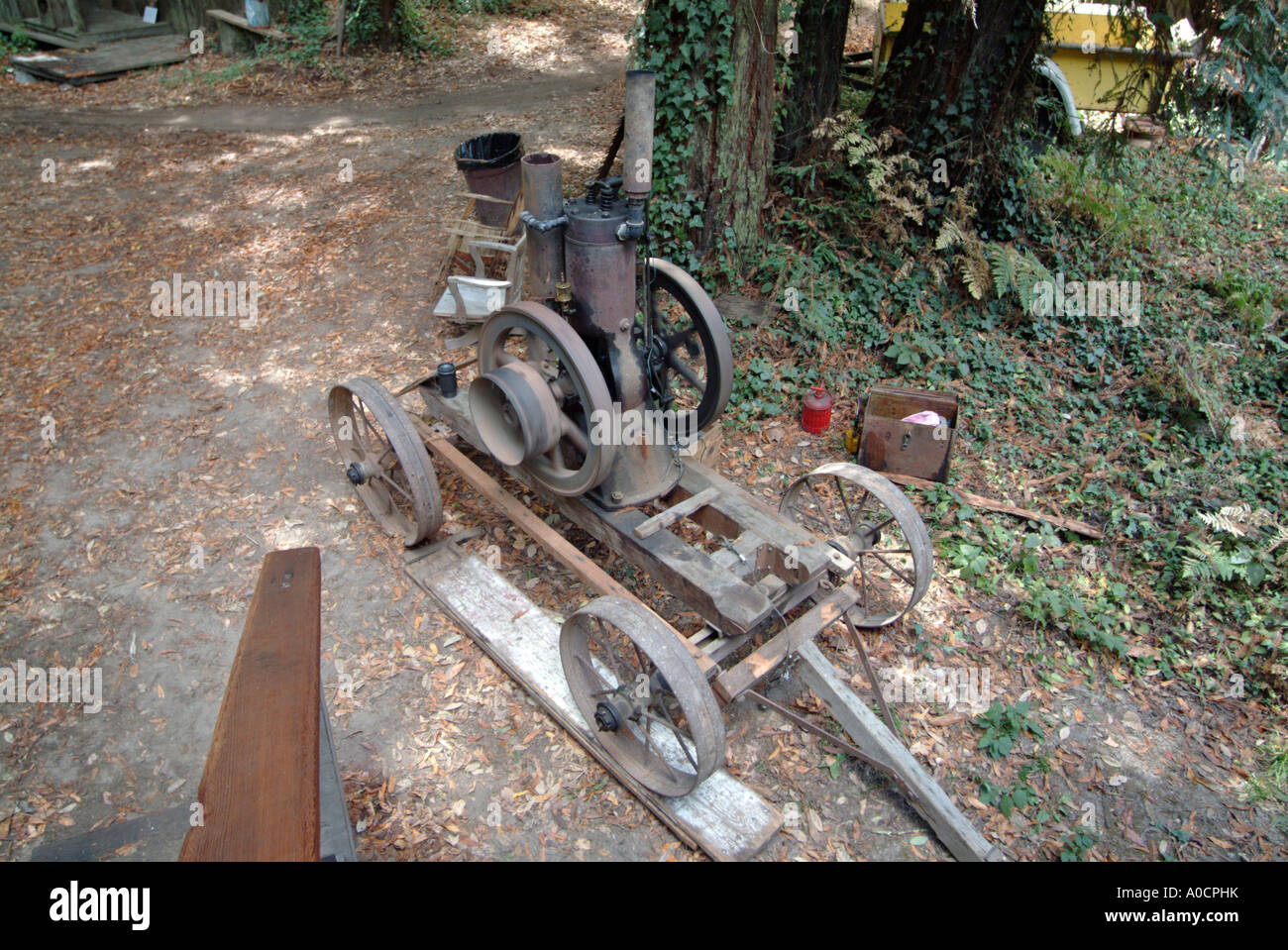 1904 antique Peerless 6 horsepower engine on an antique cart at a saw ...