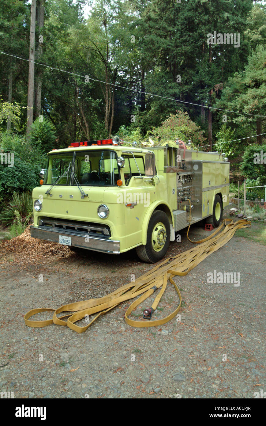 A yellow green colored fire engine for protection at an antique saw ...