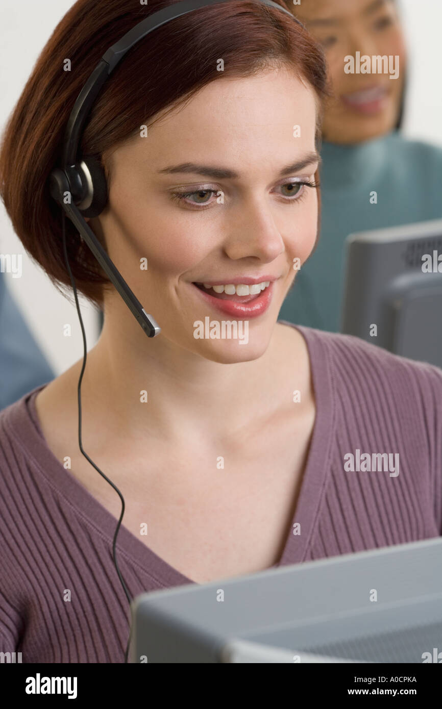 Female customer service representative Stock Photo - Alamy