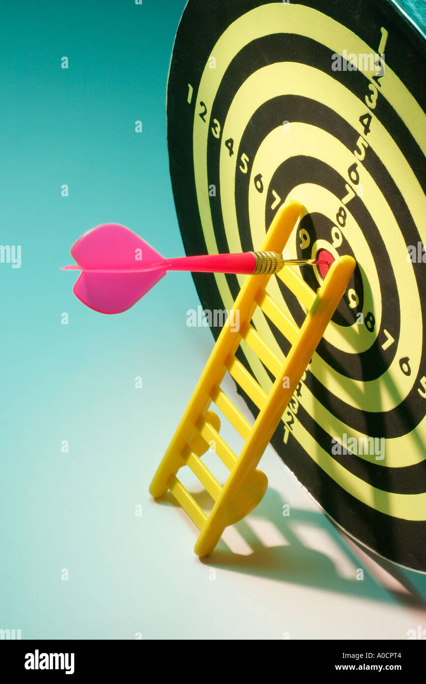 Miniature Ladder and Dart on Dartboard Stock Photo - Alamy