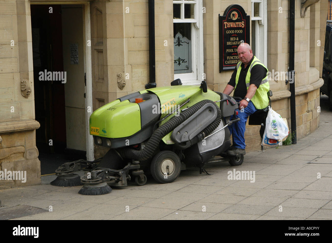 Street cleaner in Dewsbury England Stock Photo - Alamy