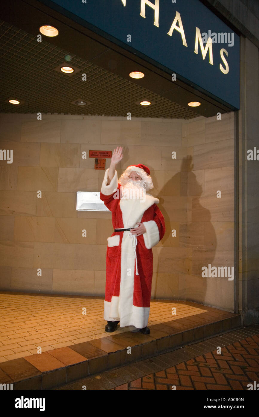 Father Christmas store greeter outside Debenhams in Perth High street ...