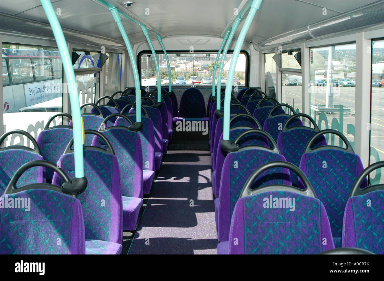 Empty seating upstairs on a First Group bus in the UK Stock Photo - Alamy