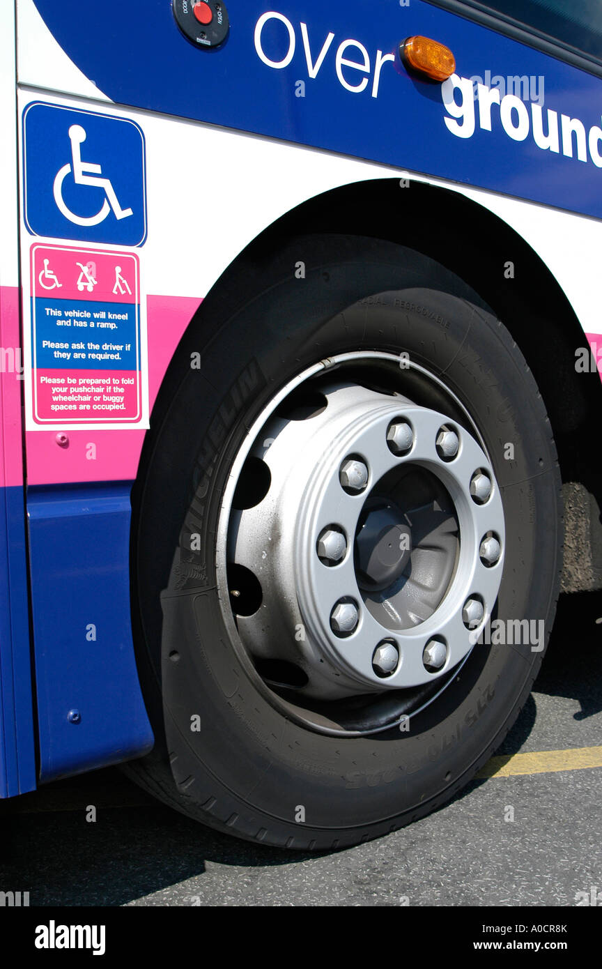 Bus wheel detail with disabled stickers by the door Stock Photo - Alamy