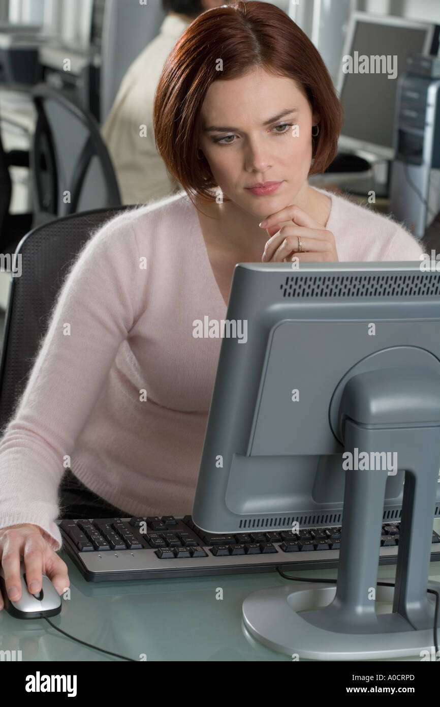 Woman female employee employees worker workers working job hi-res stock ...