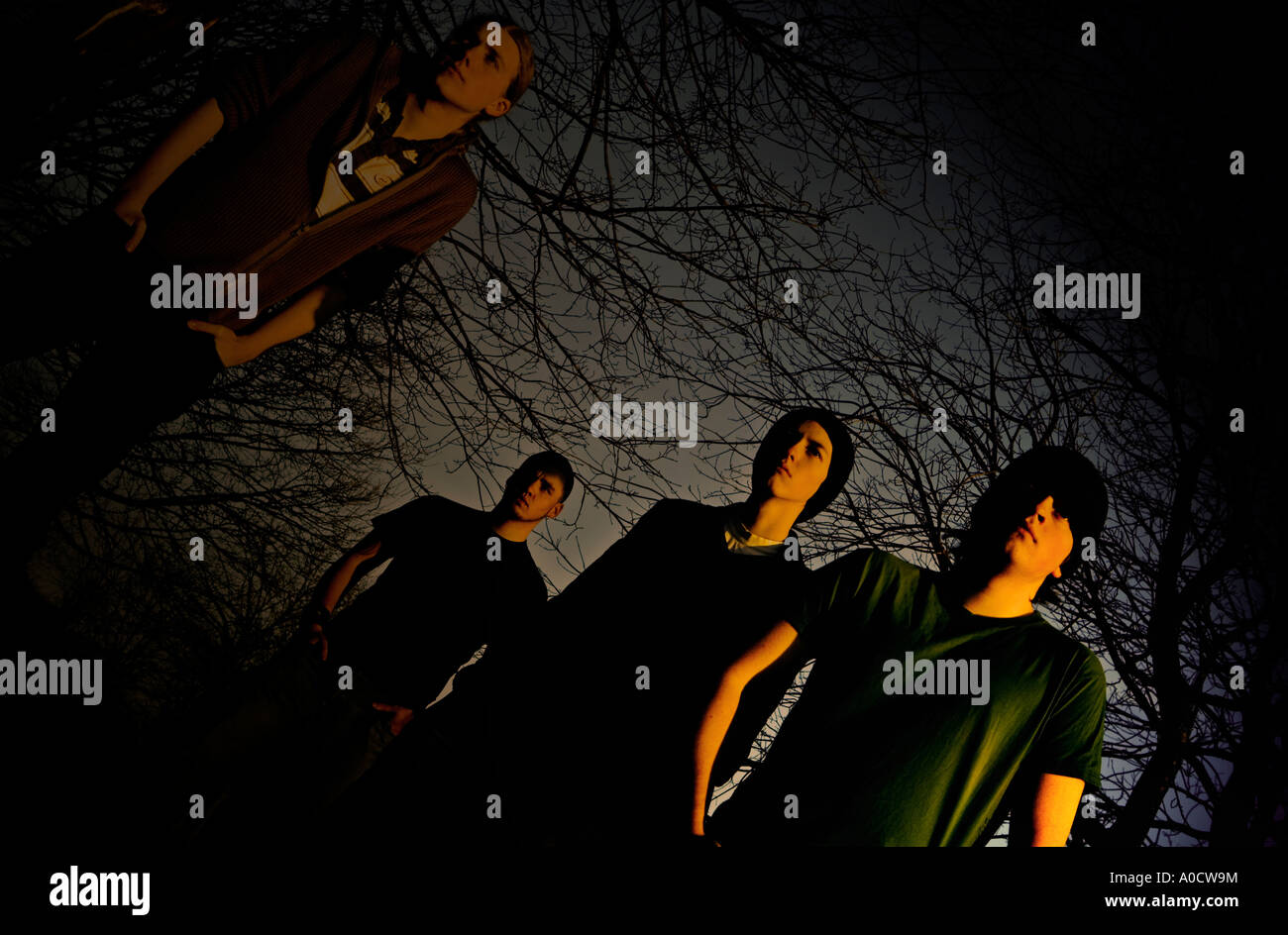 PORTRAIT OF FOUR YOUNG MEN in a group Stock Photo - Alamy