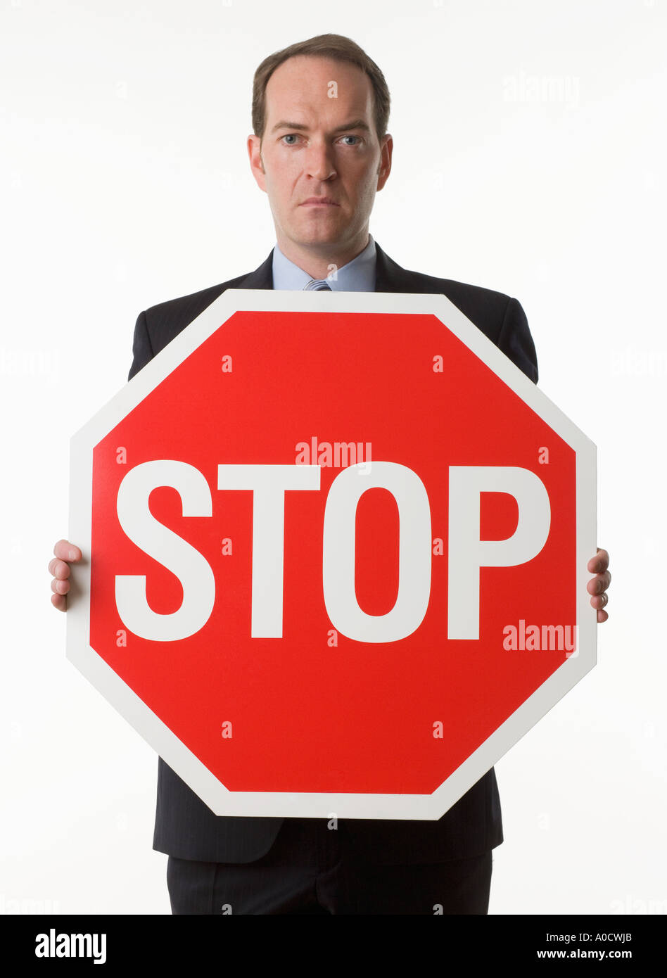 Man holding stop sign Stock Photo - Alamy