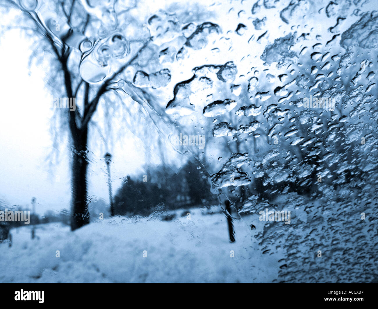 Winter scene through window Stock Photo - Alamy