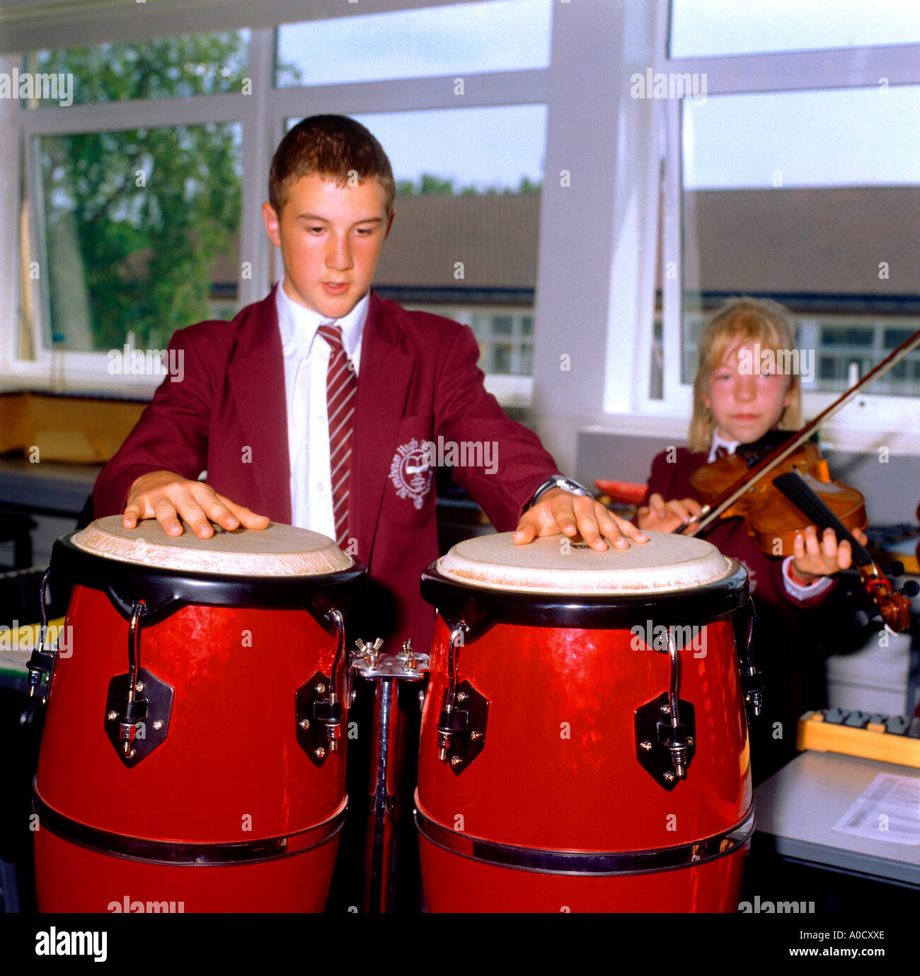 High School Music Class Pupils Playing Instruments Stock Photo - Alamy