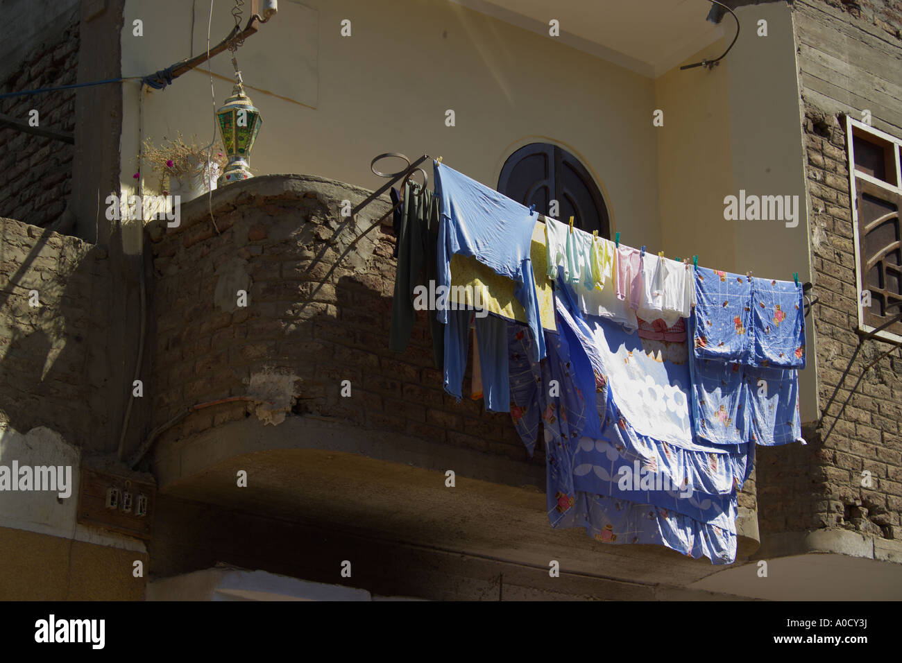 Washing hung out to dry in Egypt Stock Photo - Alamy