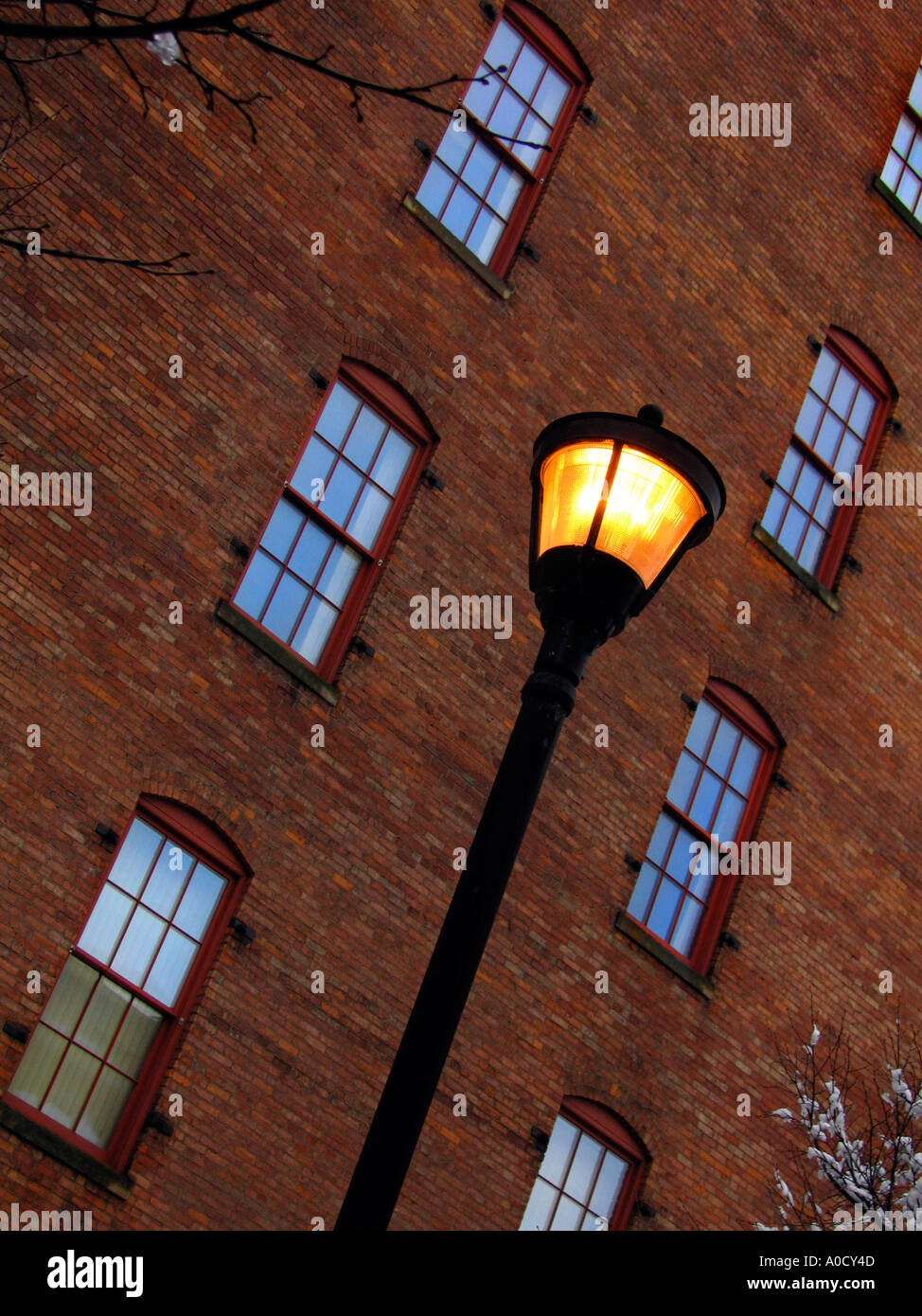 Red brick building with lamp Stock Photo - Alamy
