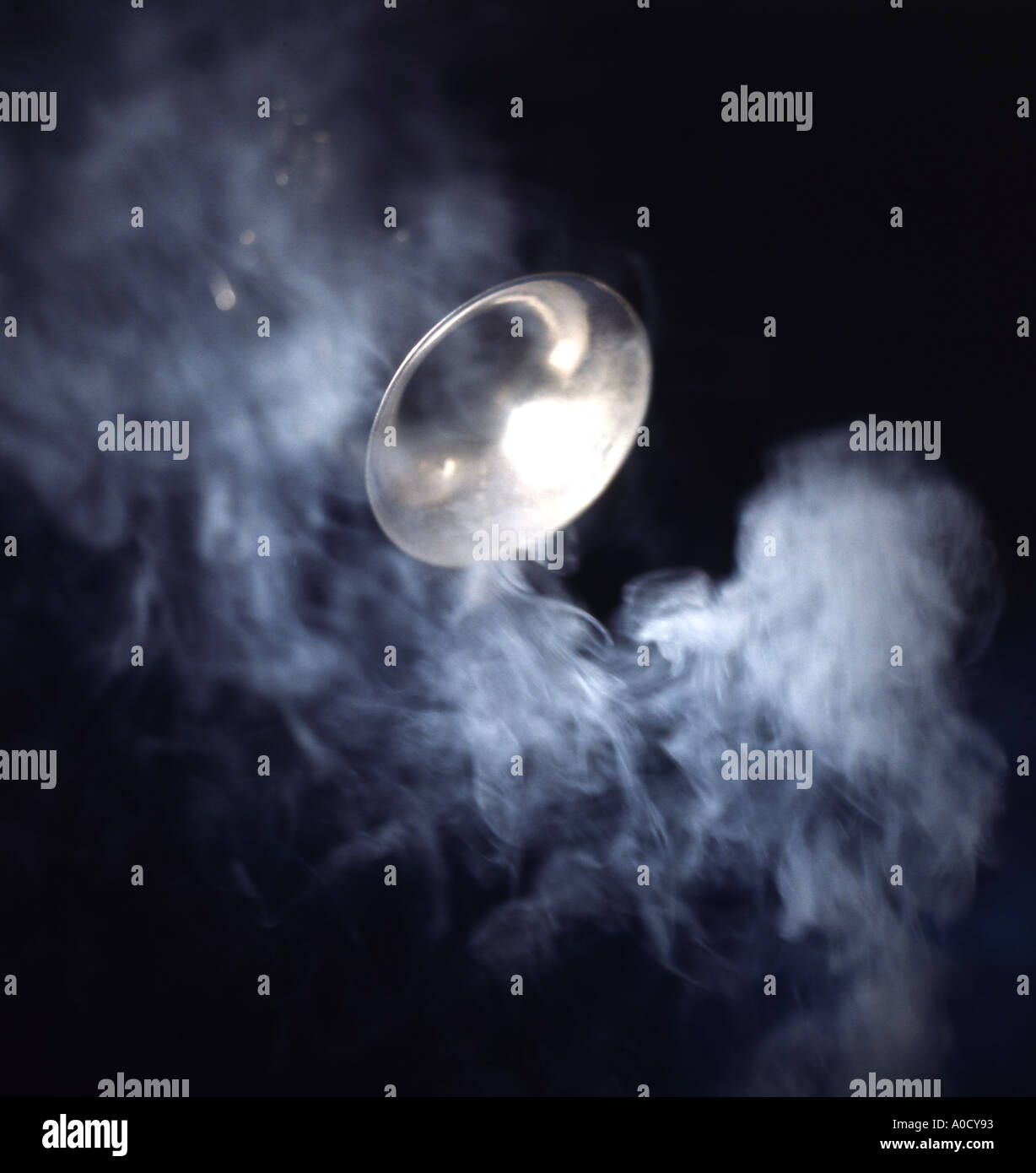 Trumpet Surrounded By Smoke Stock Photo - Alamy