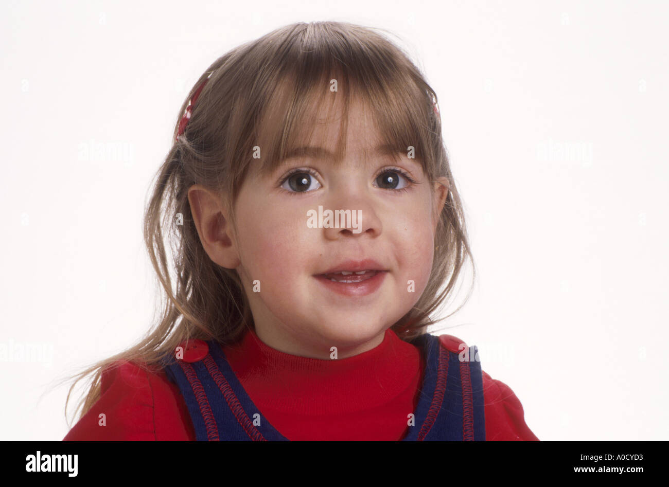 Expressive little girl posing Stock Photo - Alamy