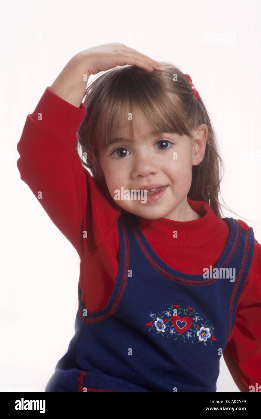 Expressive little girl posing Stock Photo - Alamy